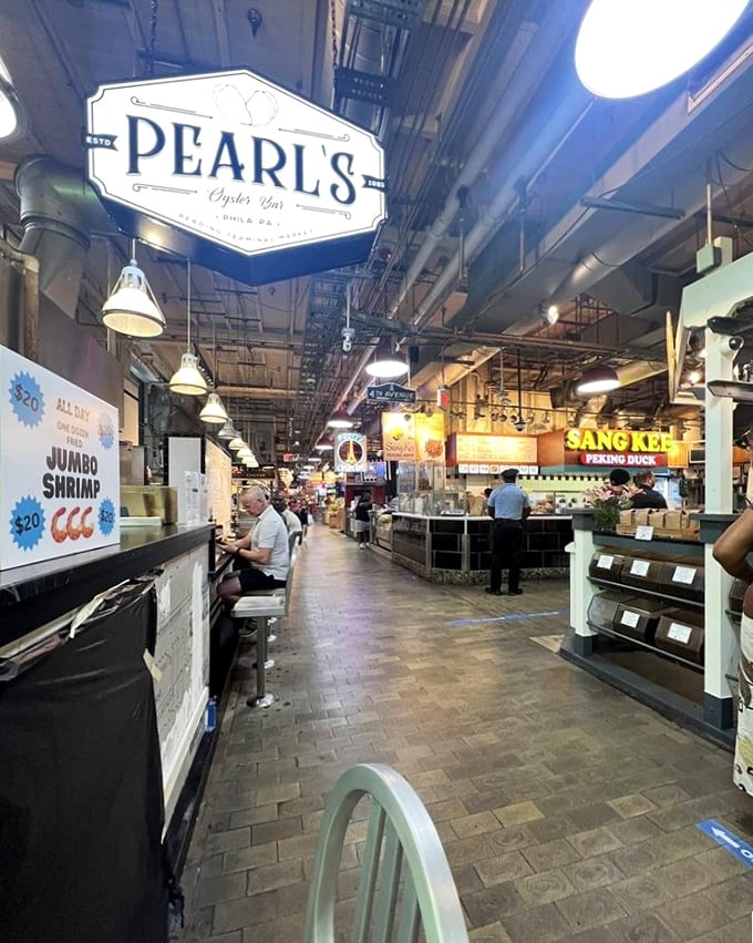 The gleaming display case showcases nature's briny treasures like edible jewels waiting to be discovered.