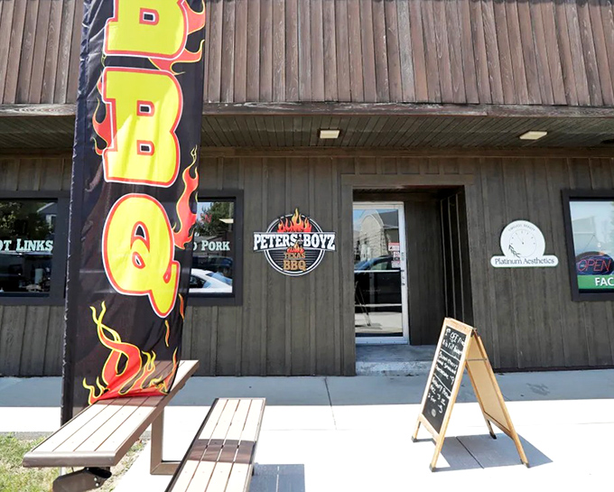 That BBQ flag fluttering outside Peters' Boyz is like a smoke signal saying "Come get it while it's hot!"