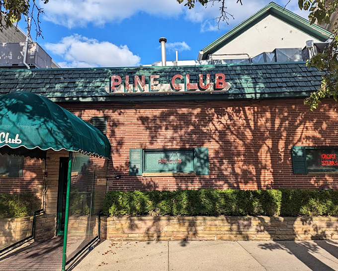 Daylight reveals The Pine Club's classic brick exterior. Decades of delicious memories have been made behind those doors.