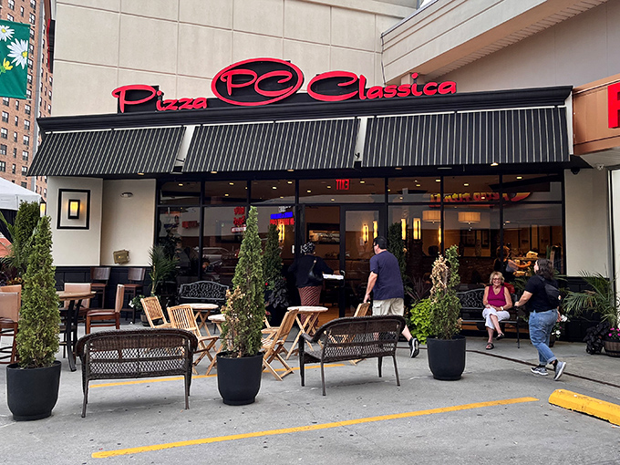 The weekend crowd at Pizza Classica proves good pizza brings people together. Those outdoor tables become community gathering spots when the weather cooperates.