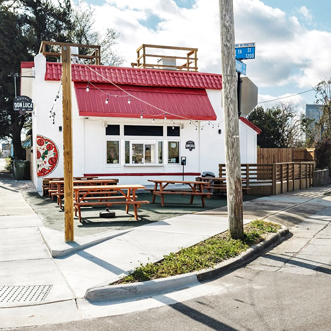 Wooden picnic tables and fresh air make Don Luca's outdoor seating the perfect spot for pizza perfection.