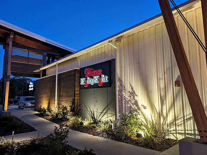 That sleek evening glow suggests prime cuts are being perfectly prepared behind those contemporary walls right now.