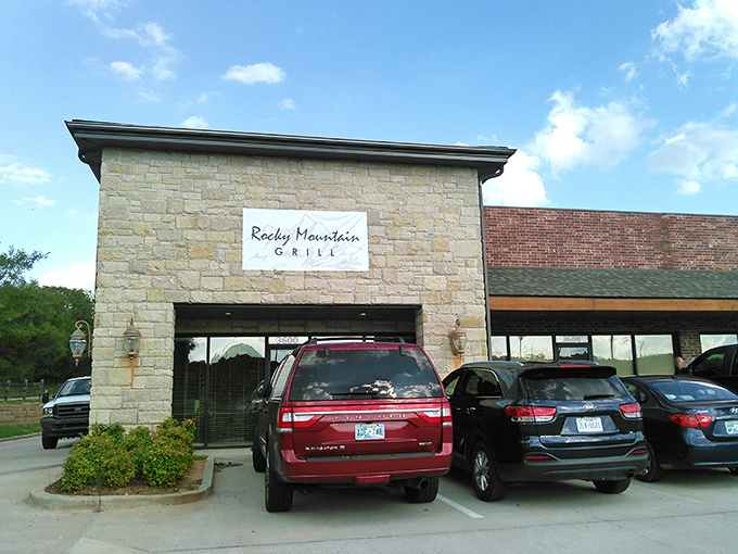 Morning light bathes Rocky Mountain Grill's entrance, where breakfast is served with mountain-sized hospitality.