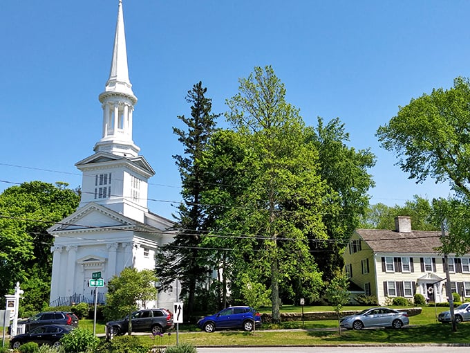 Sandwich's historic buildings stand proud against a perfect blue sky. That white church steeple reaching skyward like New England's exclamation point.
