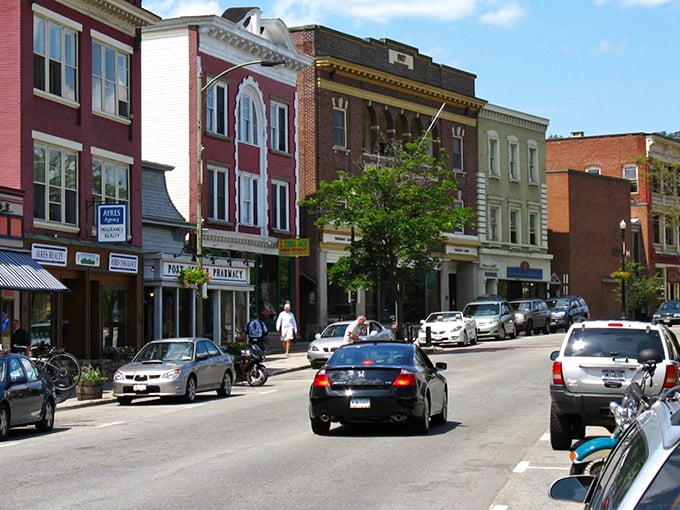 Historic storefronts line the street like old friends gathering for their daily coffee and conversation ritual.