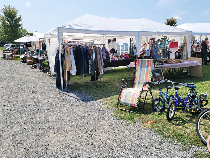 White tents and colorful merchandise create a festival atmosphere at Shen-Valley, where shopping becomes an outdoor adventure.