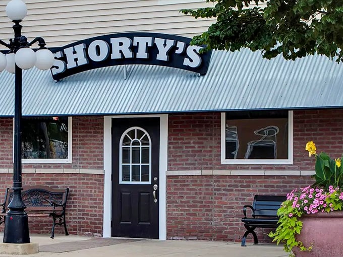 Classic small-town charm meets big-city flavor at Shorty's, where the sign promises exactly what you'll get: excellence.