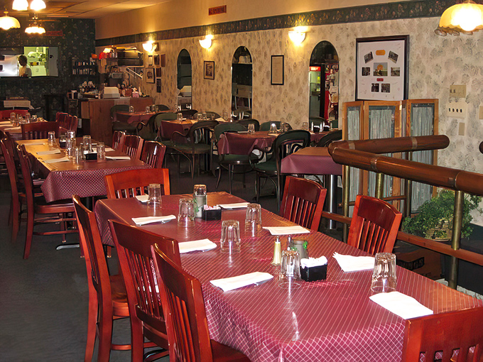 Red checkered tablecloths and warm lighting – the universal code for "comfort food served with a side of nostalgia."