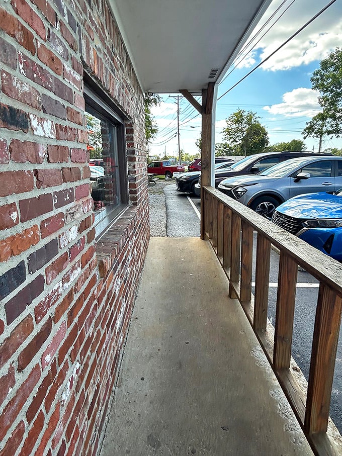 Smokey Pig Bar-B-Q offers a rustic brick path and classic wooden railings, creating a perfect spot for your next meal.