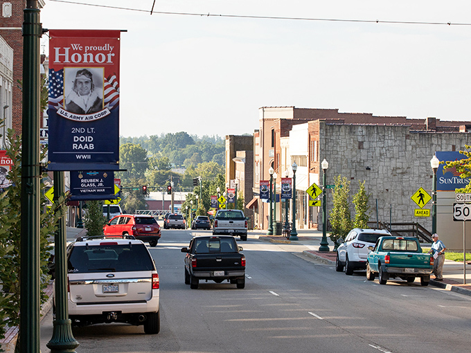 A patriotic display honors local veterans in South Boston. This town remembers its heroes while embracing its peaceful present.