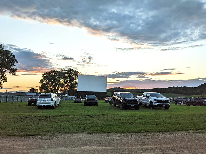 Nature's light show meets Hollywood's best! Starlite's screen awaits as vehicles gather under a Wisconsin sunset worthy of its own starring role.