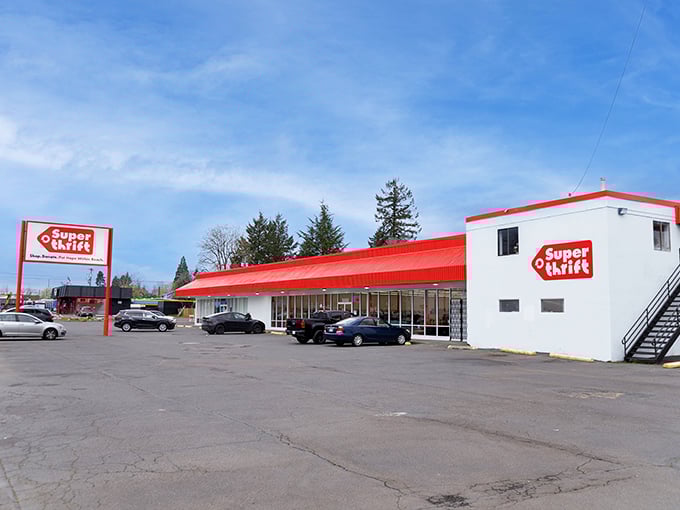 The bright red sign against clear blue skies&mdash;nature's way of saying "Stop here and save!"