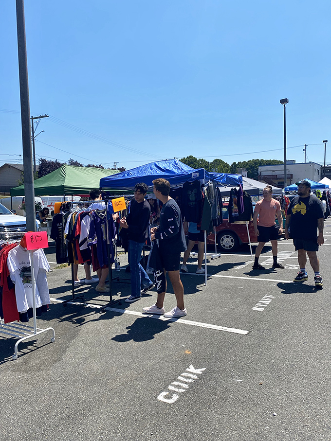 Young shoppers browse racks of vintage clothing, hunting for that perfect retro find at unbeatable prices.