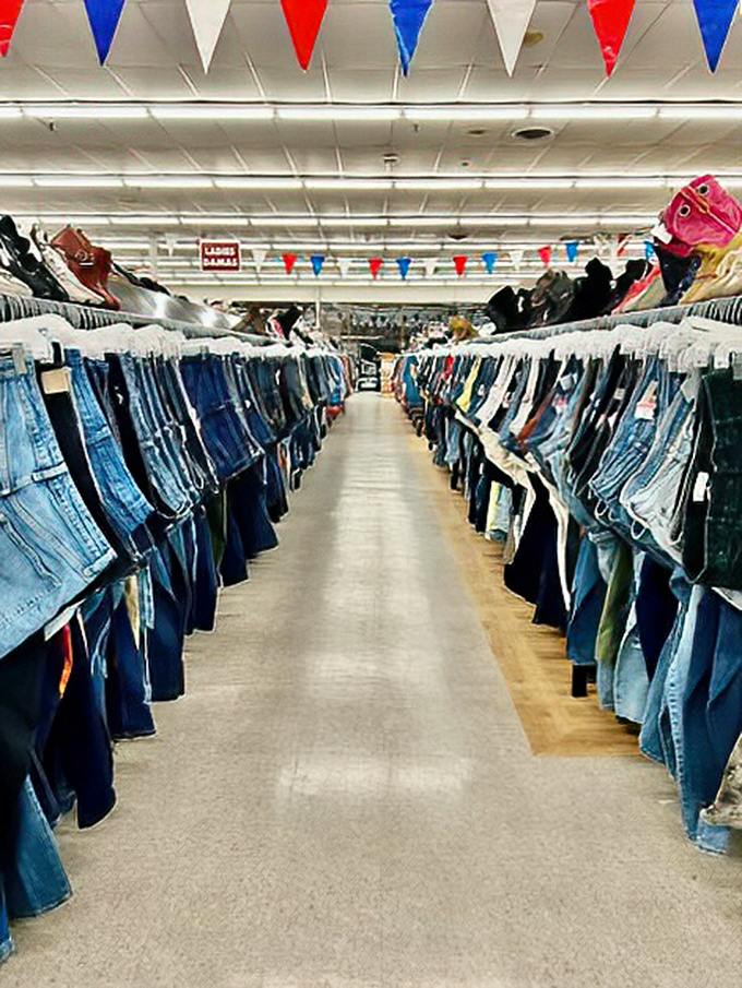 A sea of clothing racks that would make Marie Kondo both terrified and thrilled. Every aisle promises new discoveries!