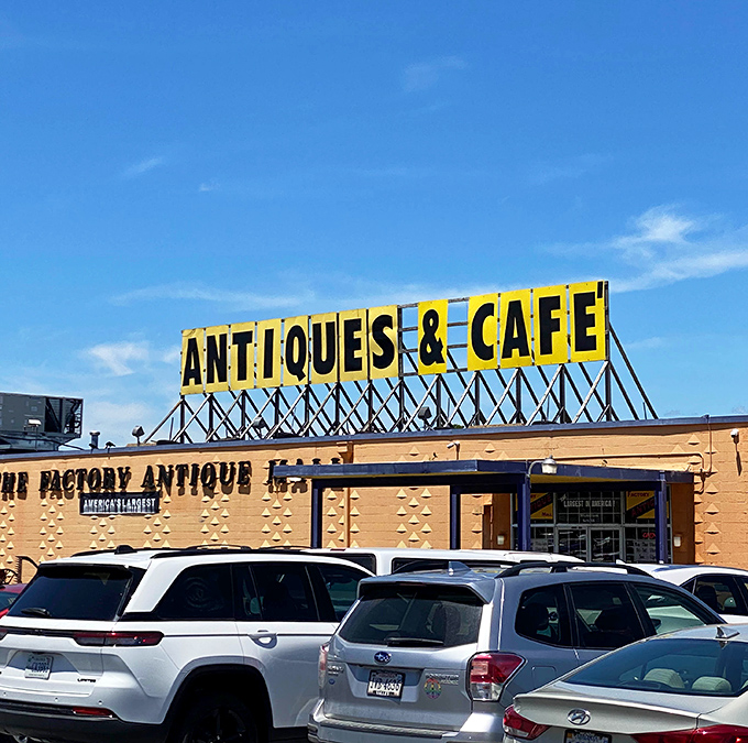 That "Antiques & Cafe" sign shines like a beacon for weary shoppers. Fuel up and forge ahead into this treasure-filled former factory!