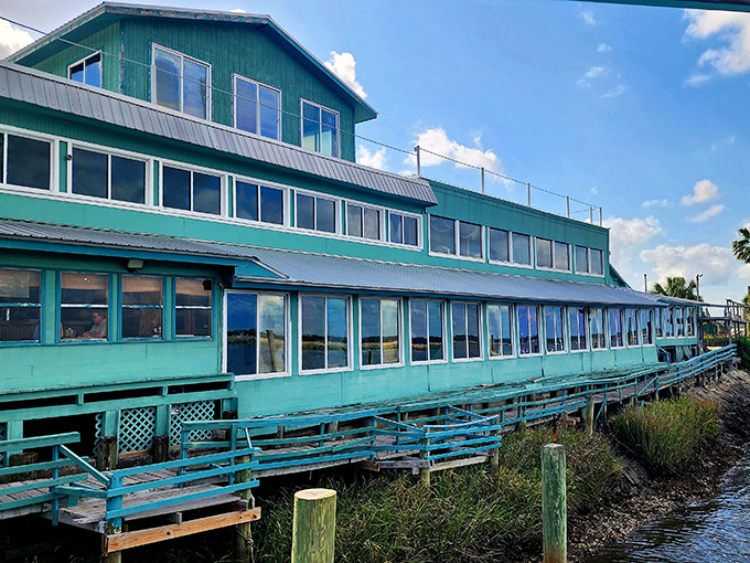 Three stories of waterfront windows mean every seat gets the million-dollar marsh view &ndash; now that's thoughtful coastal dining design.
