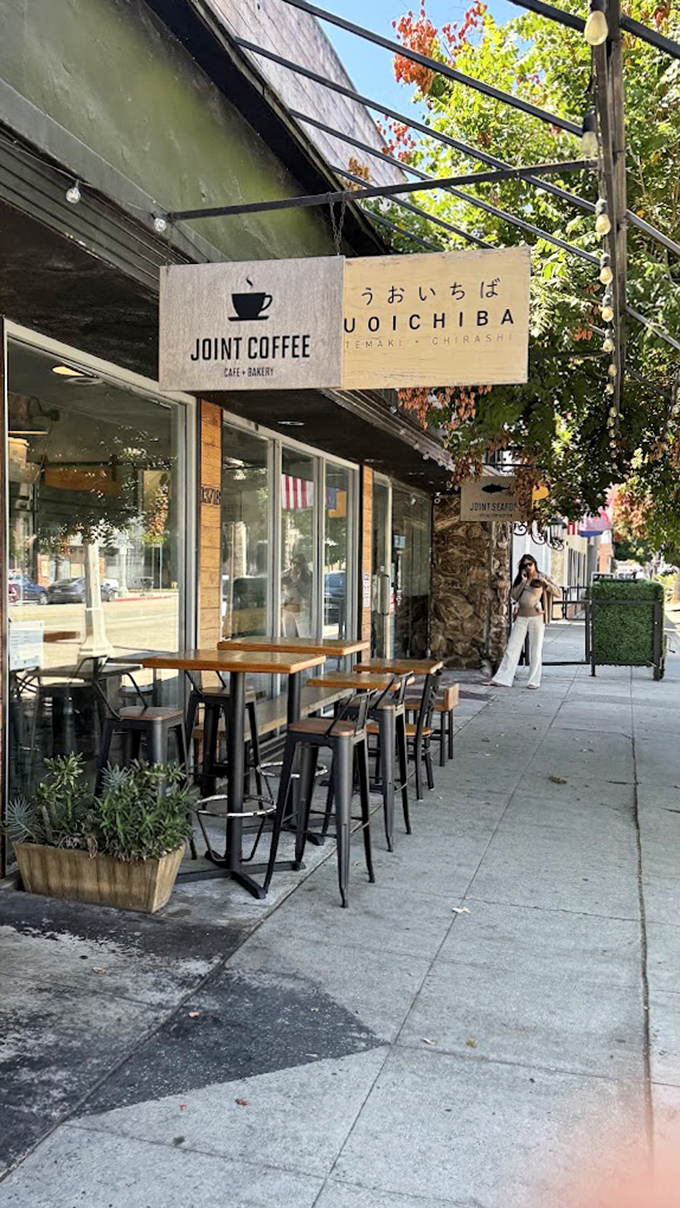 Modern meets maritime in this sleek space where morning lattes give way to afternoon ocean bounty perfectly.