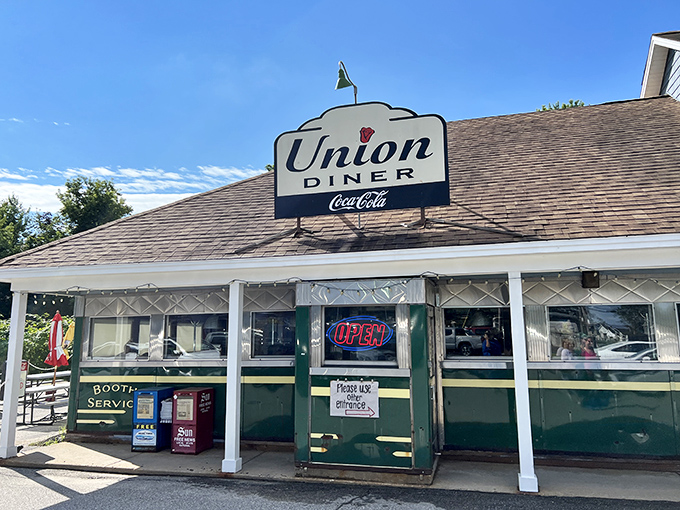 Clear blue skies frame the Union Diner's vintage sign, a promise of coffee refills and conversations that never run dry.