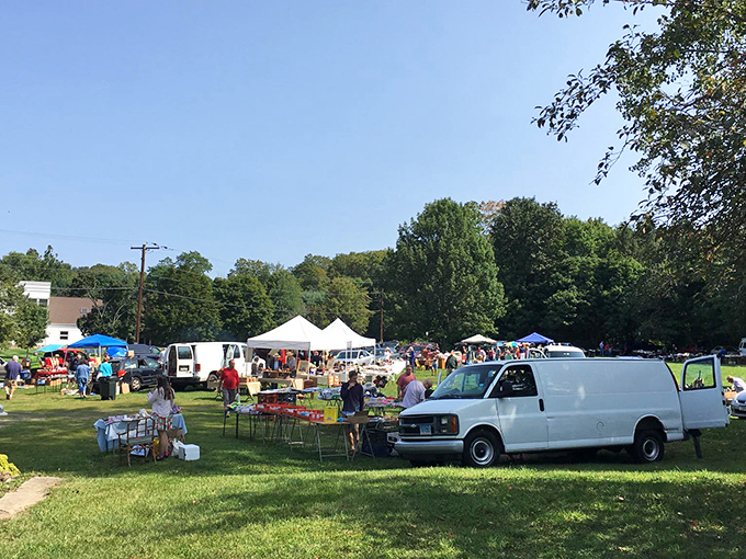 Green hills frame the perfect Sunday outing where vendors spread their wares and families make memories between the white tents.
