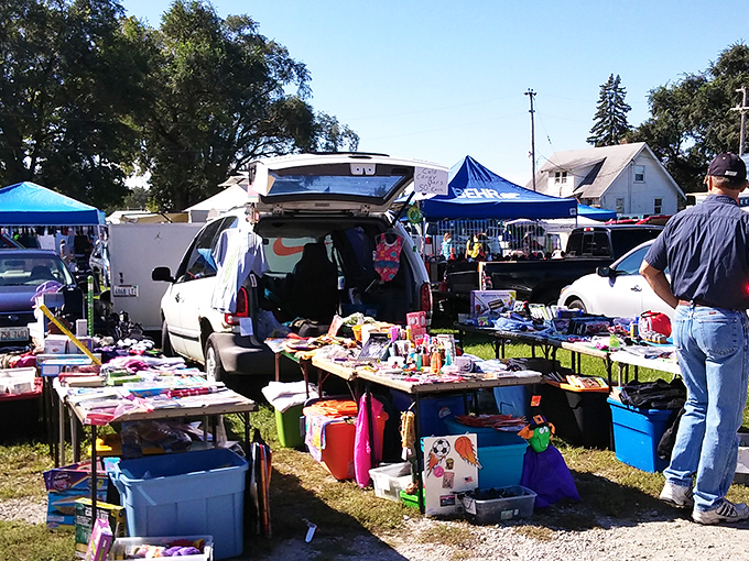 Makeshift displays and folding tables transform an ordinary field into a bargain hunter's playground at Uncle John's.