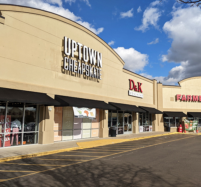 Nestled between retail neighbors, Uptown Cheapskate brings secondhand shopping to the mainstream with its polished storefront and curated collection.