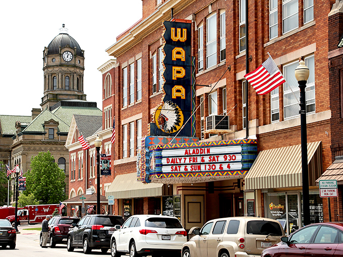 The classic marquee of Wapakoneta's theater lights up the street, a beacon of entertainment that's been drawing crowds since your grandparents' date nights.