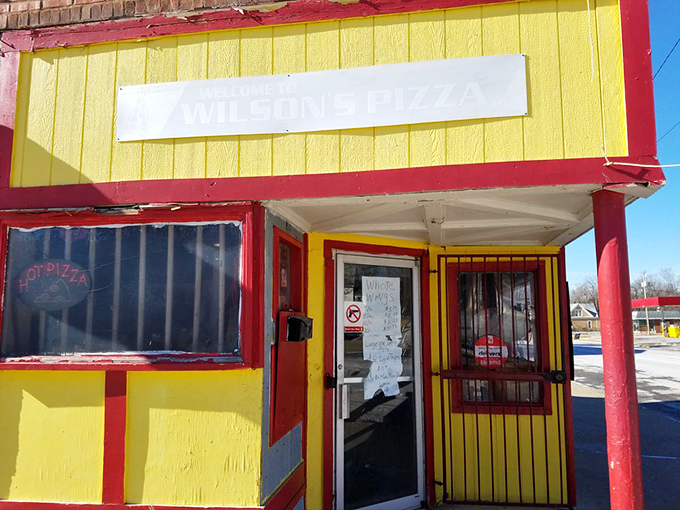 Wilson's no-frills exterior hides pizza treasures within. Sometimes the best flavor comes in the brightest packages!