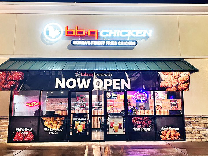 The illuminated sign promises a crispy chicken experience that'll make you rethink everything you thought you knew about fried birds.