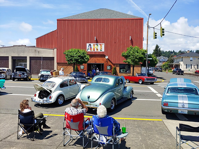 Classic car enthusiasts gather at the Aberdeen Art Center, where automotive nostalgia meets community celebration.