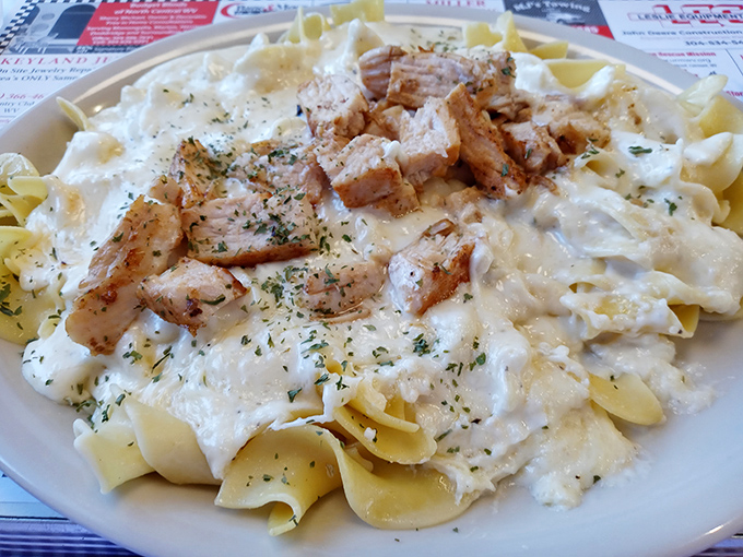 Pasta Alfredo that would make Frank Sinatra snap his fingers in approval &ndash; creamy, indulgent, and topped with perfectly seasoned chicken.