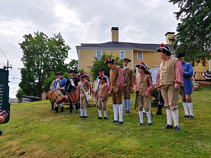 History doesn't just live in books here&mdash;these Revolutionary War reenactors bring America's origin story to life with authentic flair and impressive hat game.