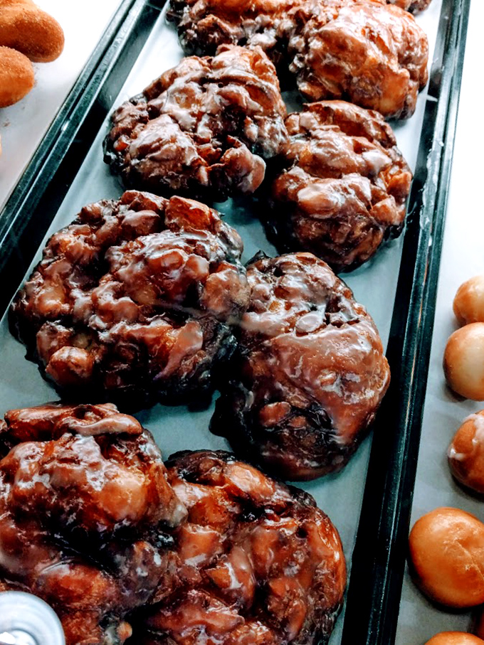 Apple fritters that look like they've been working out&mdash;muscular, glazed, and not apologizing for their glorious excess.