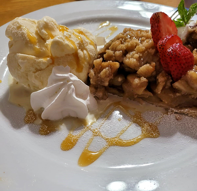 Apple pie à la mode with a crumble top that makes you wonder why anyone bothers with birthday cake when this exists in the world.