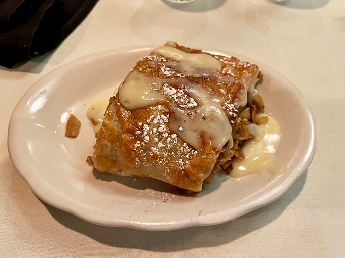 Bread pudding with a golden crown of sweetness that would make even your grandmother nod in respectful approval.