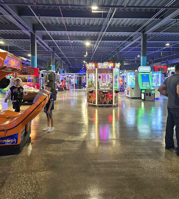 Arcade heaven spreads out in a kaleidoscope of lights and sounds, each game a portal to that perfect childhood Saturday when your quarters seemed endless.