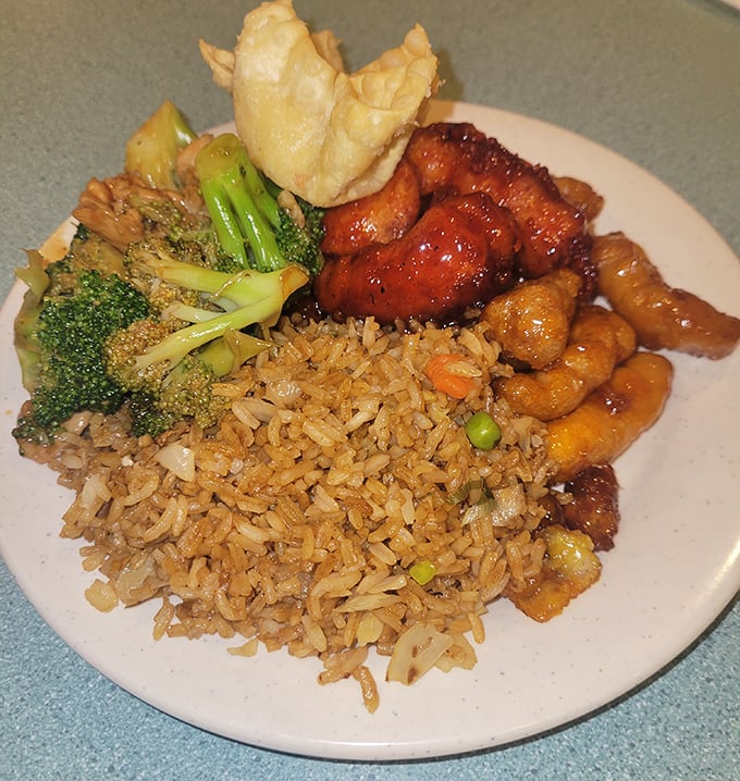 The perfect buffet plate – a little geography lesson where fried rice plains meet mountains of orange chicken and broccoli forests.