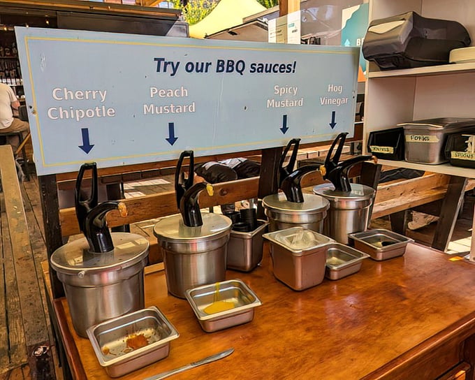 Sauce station: where good BBQ goes to dress up. These homemade concoctions range from sweet to heat, each waiting for its perfect meat match.
