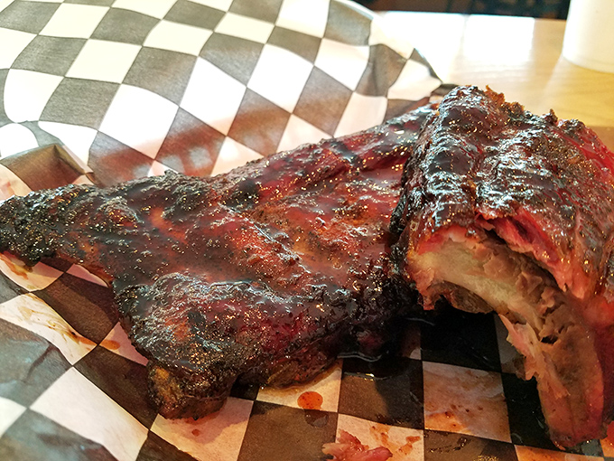 These ribs have that perfect bite &ndash; not falling off the bone, but surrendering with dignity. The hallmark of proper smoking technique.