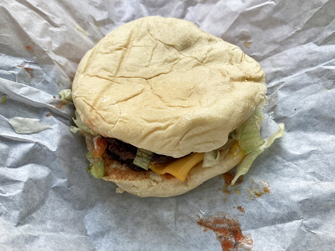 Behold the humble cheeseburger in its natural habitat&mdash;simple, unpretentious, and ready to make your taste buds throw a party.