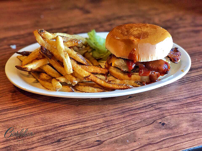 This isn't just a sandwich&mdash;it's edible Alabama heritage, where generations of barbecue wisdom are delivered between two humble buns.