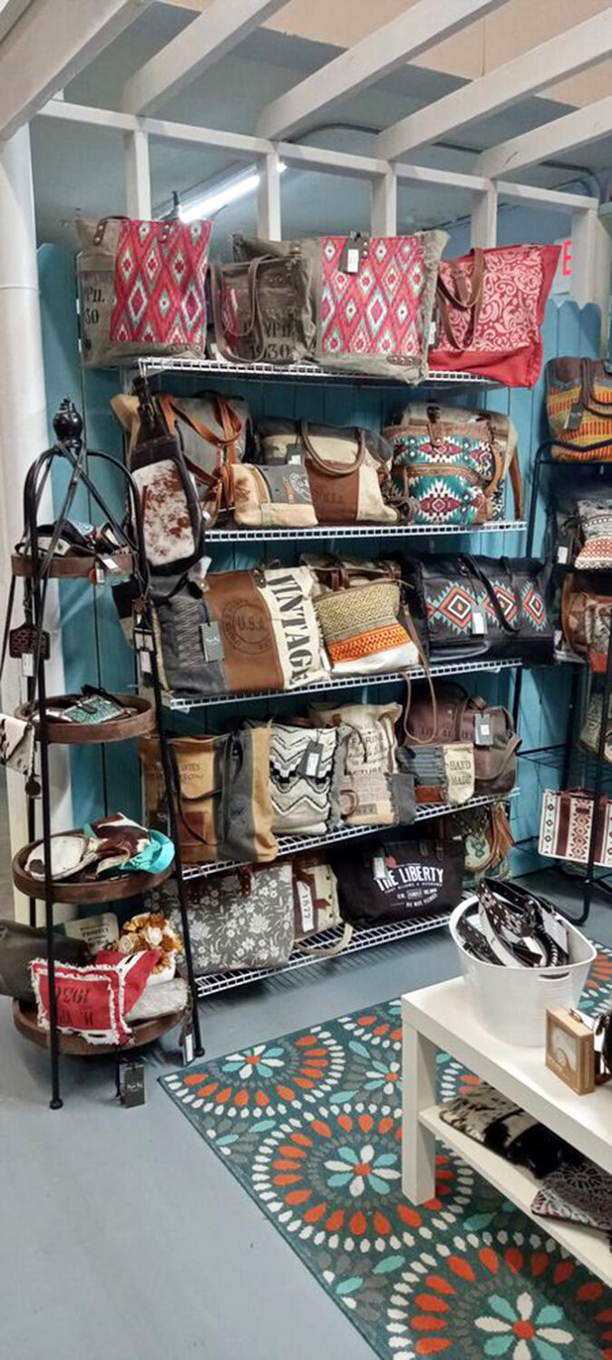 Not your average handbag collection. These vintage-inspired carriers prove style doesn't need a smartphone pocket to be functional.