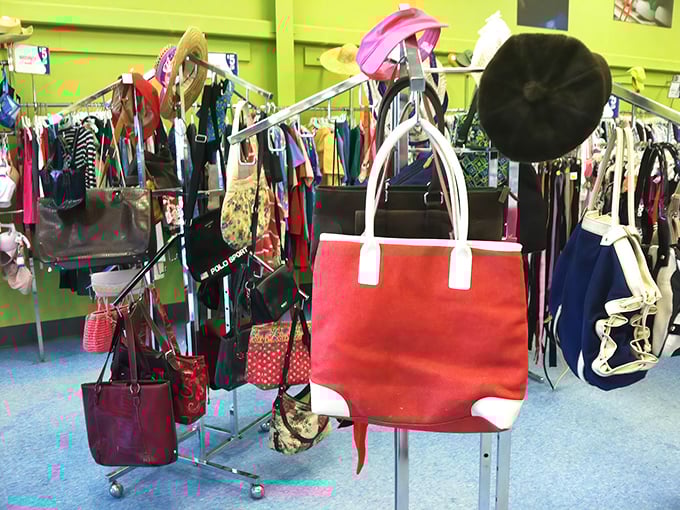 Handbag heaven or purse purgatory? These once-prized accessories hang in suspended animation, ready for their second act in someone else's fashion story.