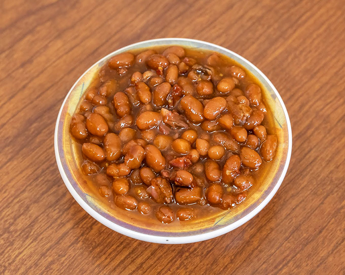 Baked beans that have clearly been introduced to the barbecue rather than just waving at it from across the room.