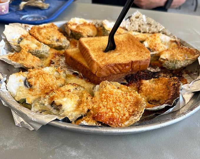 Baked oysters with a golden crown of parmesan that makes you wonder why anyone would eat oysters any other way. The toast is just a bonus.