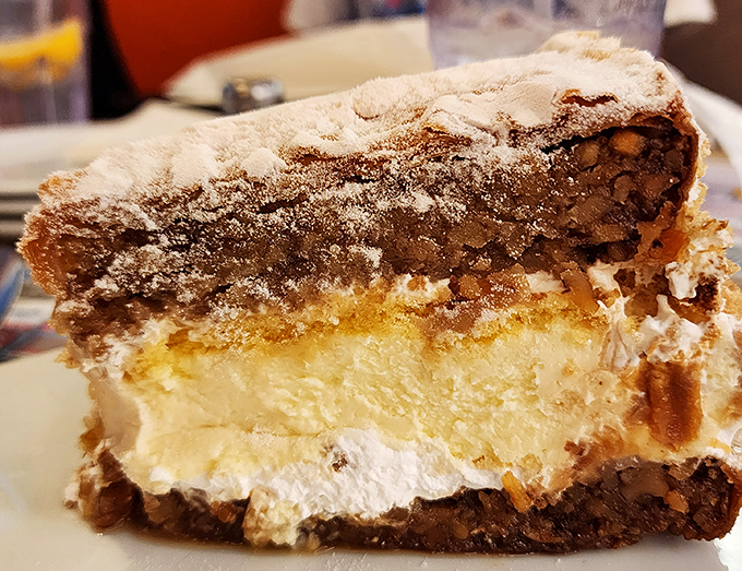 This isn't just dessert&mdash;it's architecture. Layers of flaky pastry, creamy filling, and nuts create a sweet skyscraper worth every calorie. 