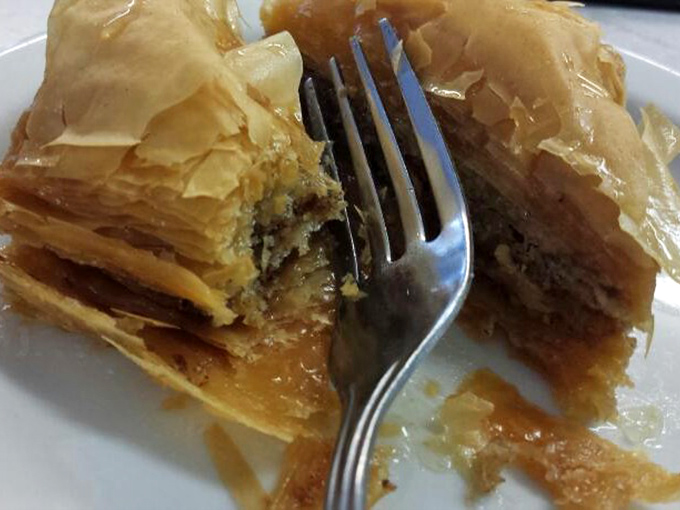 Layers of phyllo as delicate as butterfly wings cradle honey-soaked nuts in a baklava that would make any Greek grandmother nod in approval.