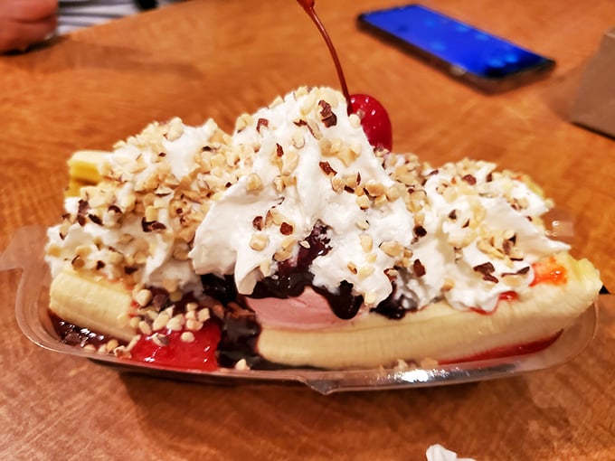 The banana split: architectural masterpiece, nutritional nightmare, and absolutely worth every calorie-laden, whipped-cream-topped bite.