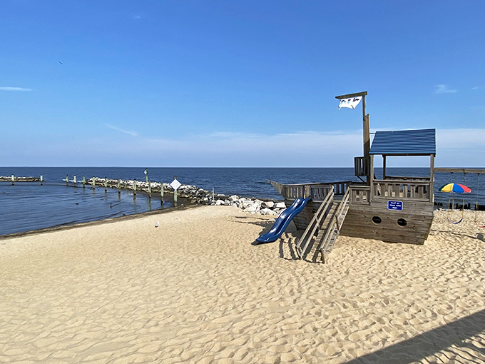 A playground that doubles as a pirate ship? This beach knows childhood joy never expires, even when your knees do.