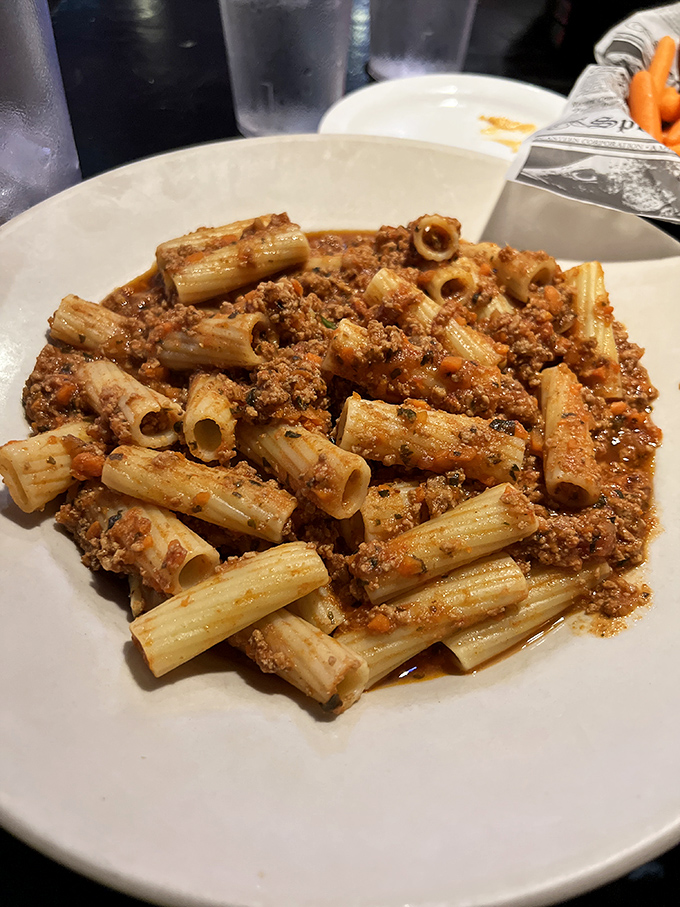 Pasta that doesn't need a passport to transport you to Italy. This hearty bolognese clings to each rigatoni like it's afraid of abandonment.