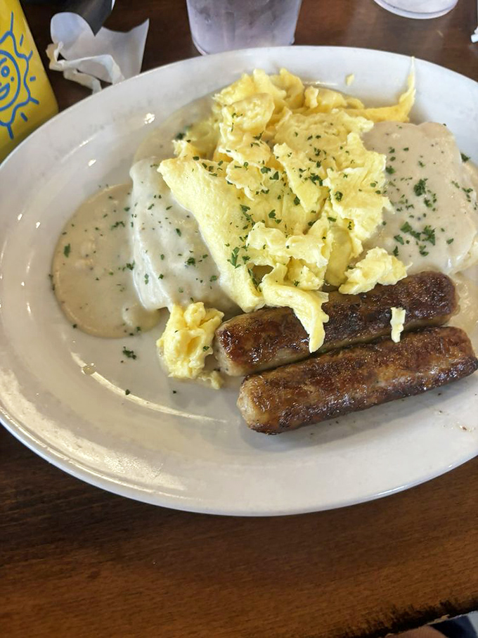 Biscuits and gravy with eggs and sausage&mdash;the breakfast that says, "You won't be hungry again until sometime next Tuesday."